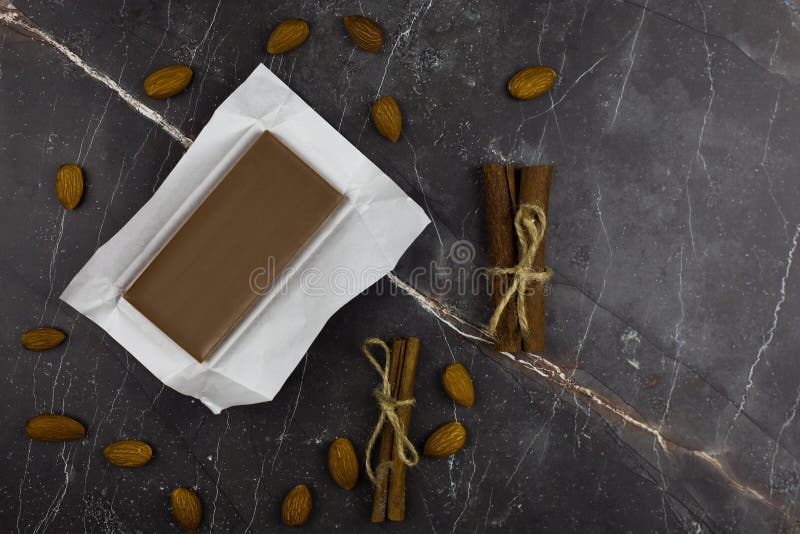 Rectangular Chocolate Bar in an Open Paper Package Stock Image - Image ...