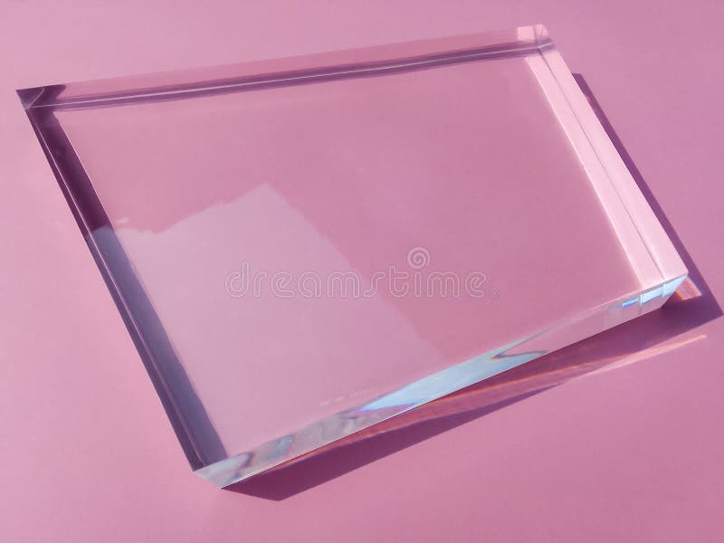 A Rectangular Clear Acrylic Plastic Thick on a Pink Surface Stock Image ...
