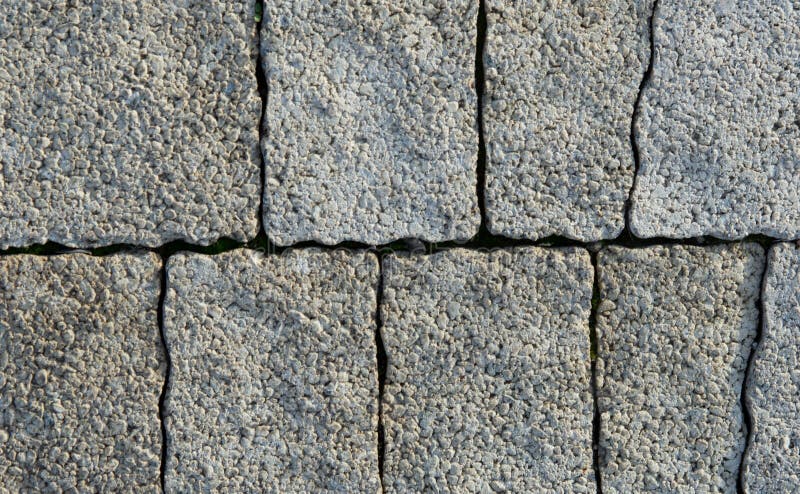 Rectangular Dark Gray Blocks Stacked Vertically and in Rows with Porous ...