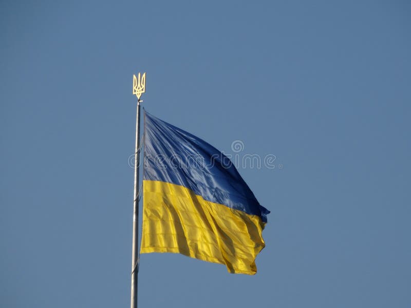A Rectangular Flag of Blue Top and Yellow Bottom Colors, Flying on a ...