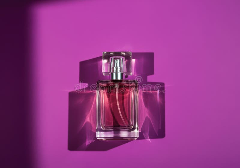 A Rectangular Glass Bottle with Clear, Sharp Edges Contains a Deep Pink ...