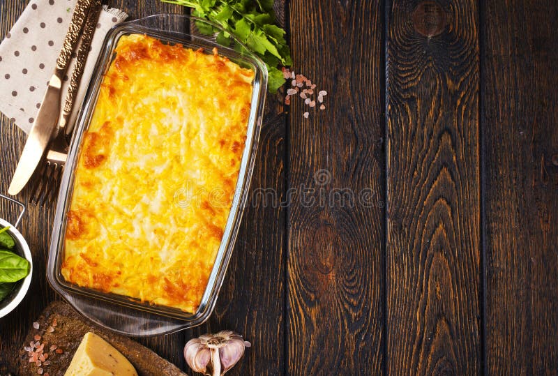 Rectangular Glass Bowl Filled with Mashed Potato, Underneath Which is ...