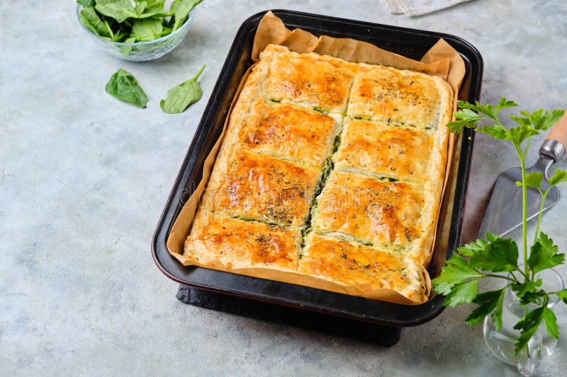 A Rectangular Greek Pie with Spinach and Cheese Filling for Baking on a ...
