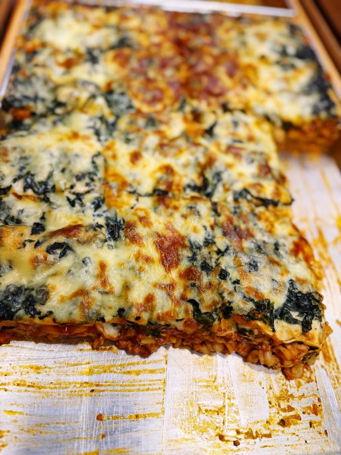 Italian Lasagna with Spinach and Cheese on a Wooden Board Close Up ...