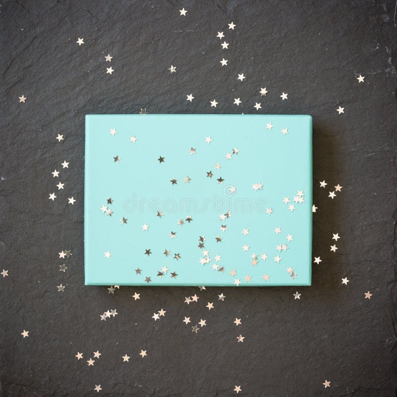Rectangular Light Blue Box on Black Background with Silver Stars ...