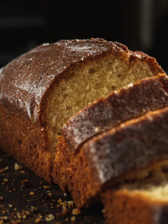 Rectangular Loaf Cut into Pieces with a White Sprinkle is on a Rusty ...