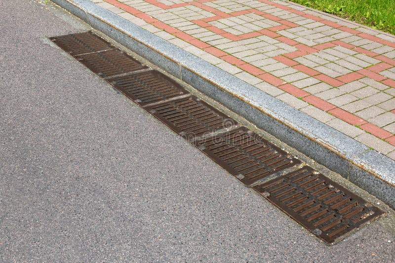Rectangular Manholes of the Lattice of the Drainage System. Stock Photo ...