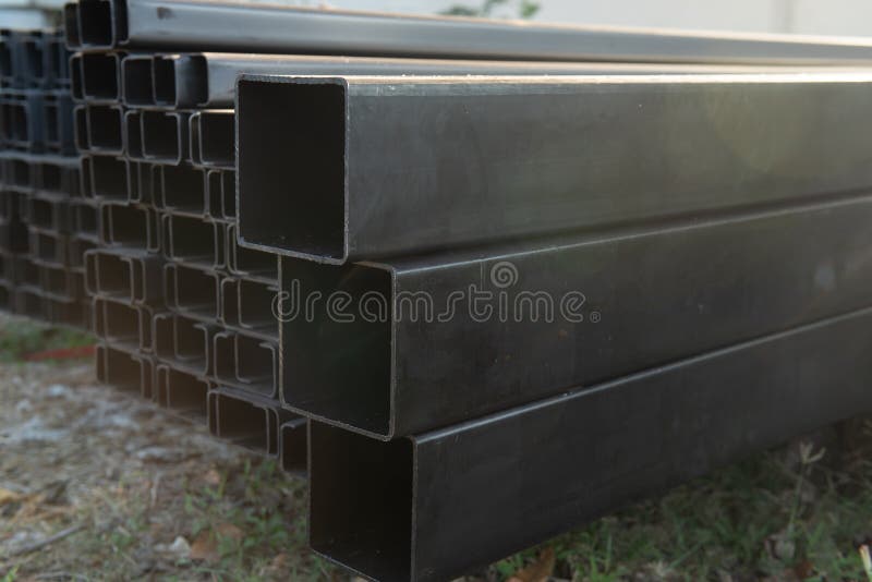 Rectangular metal pipes stock photo. Image of cylinder - 153771602