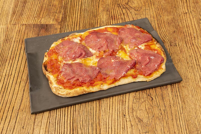 Rectangular Pizza with Serrano Ham, Tomato and Mozzarella Baked in a ...