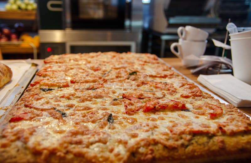 Fresh Pizza on Tray for Sale at Small Cafe Stock Photo - Image of ...