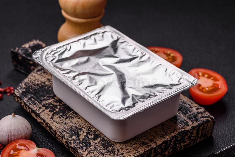 Rectangular Plastic Box with Yogurt or Cheese Hermetically Sealed with ...