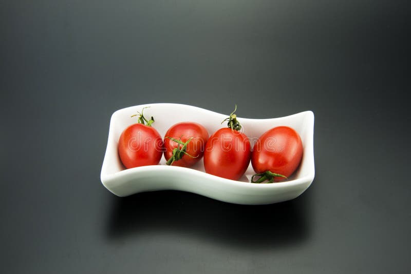 Rectangular Plates in the Small Red Tomatoes Stock Photo - Image of ...