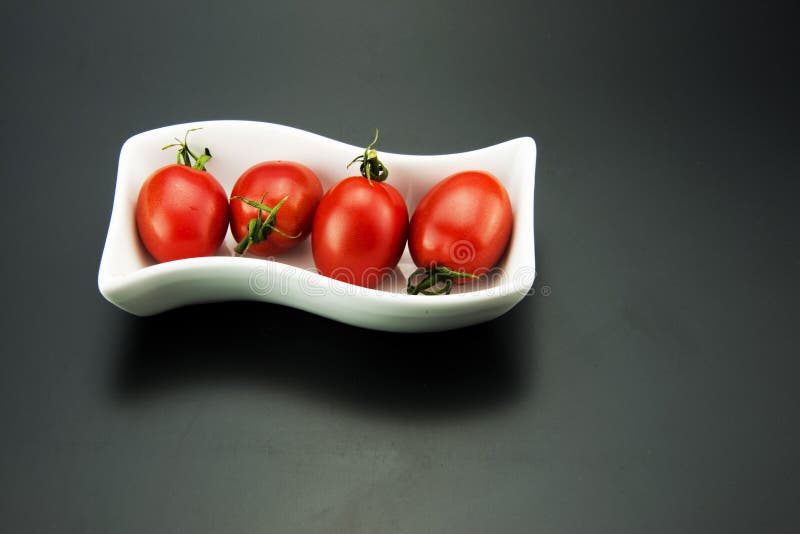 Rectangular Plates in the Small Red Tomatoes Stock Photo - Image of ...