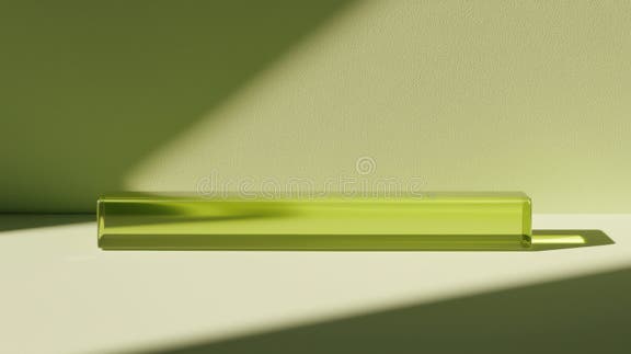 A Rectangular Prism-shaped Object with a Green Tint Sits on a Light ...