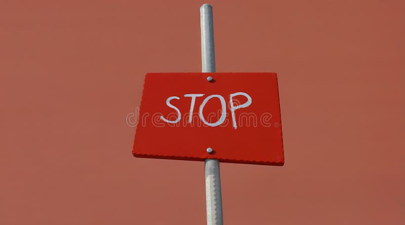 Rectangular Red Stop Sign Against Muted Orange Background Stock ...