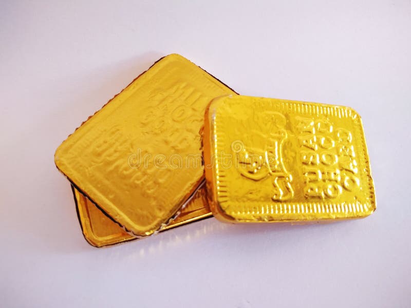 Rectangular Shaped Chocolate Wrapped in Gold-colored Aluminum Foil ...