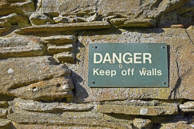 Danger Keep Off Walls Sign on Ancient Stone Wall at Balmerino Abbey ...