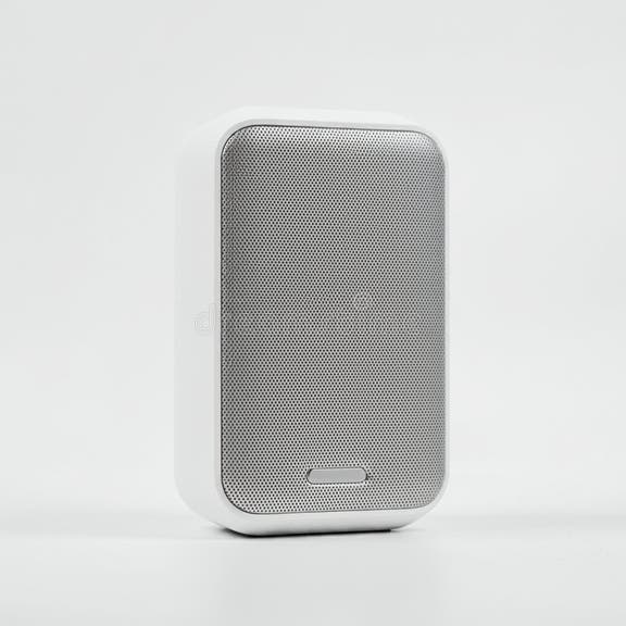 Rectangular Speaker with Rounded Edges, Featuring a White Casing and a ...