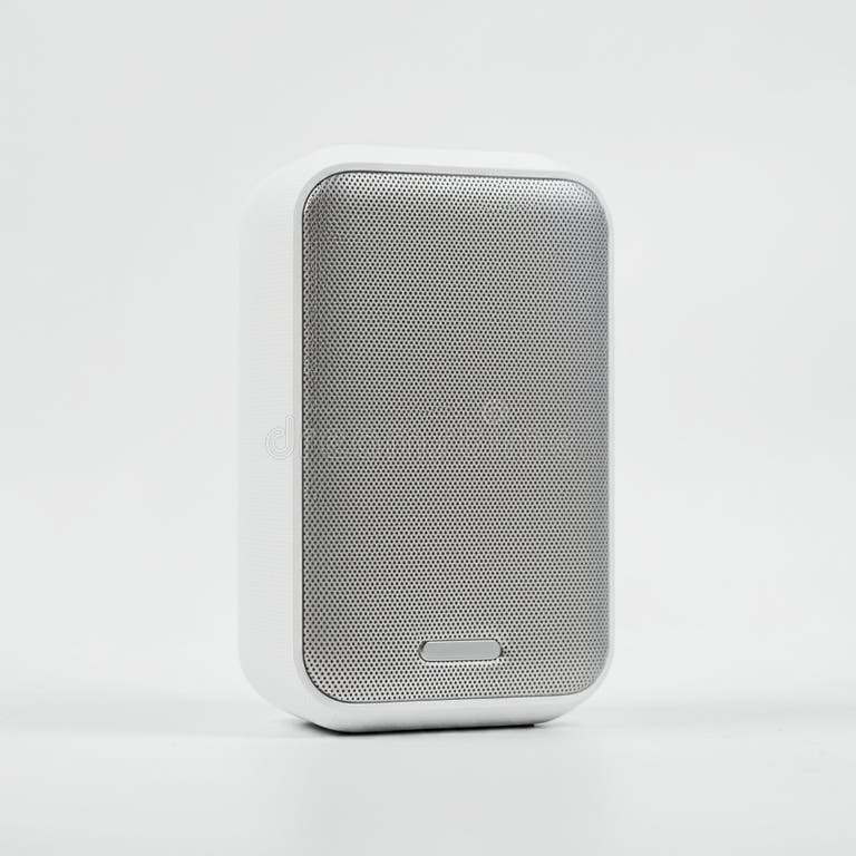 Rectangular Speaker with Rounded Edges, Featuring a White Casing and a ...
