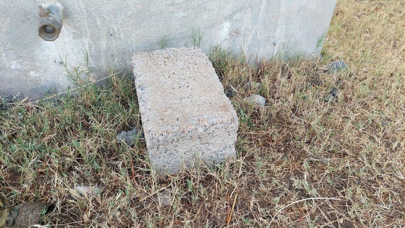 The Use of Rectangular Concrete Bricks To Decorate the Fence Make a ...