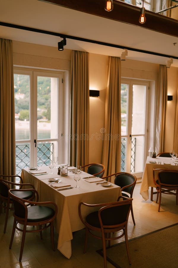 Rectangular Table in the Interior of a Classic Restaurant Near High ...