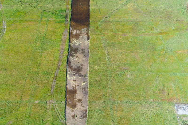 Rectangular Trench Excavated in a Field for the Preparation of a ...