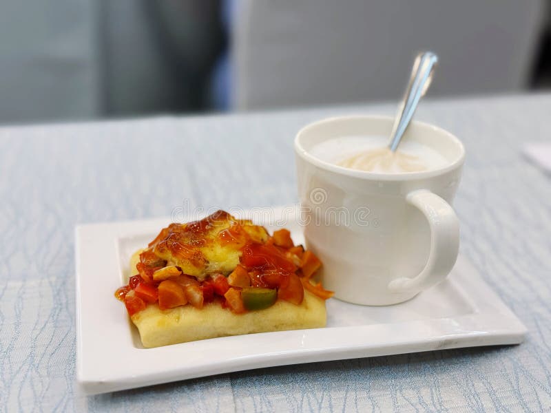 Slices of Toasted Bread with Vegetables on a White Plate Stock Photo ...