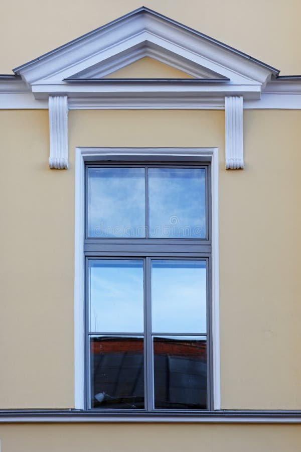 Window with a visor stock photo. Image of cornice, glass - 211244288