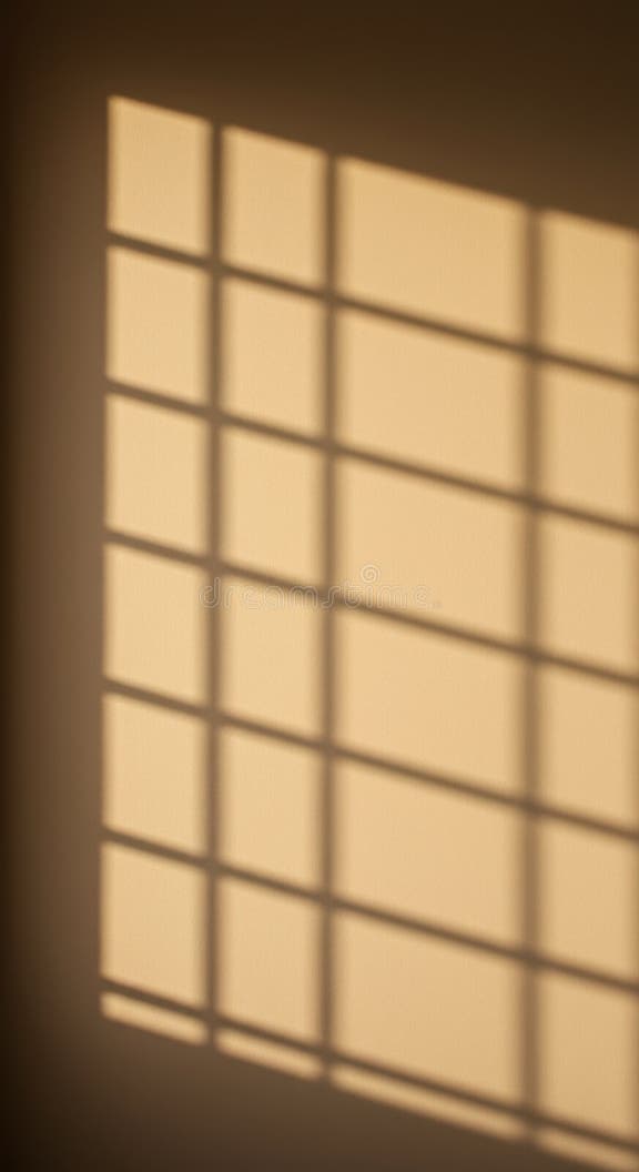 Rectangular Window Pane Shadows Create a Grid Pattern on a Warm Wall ...