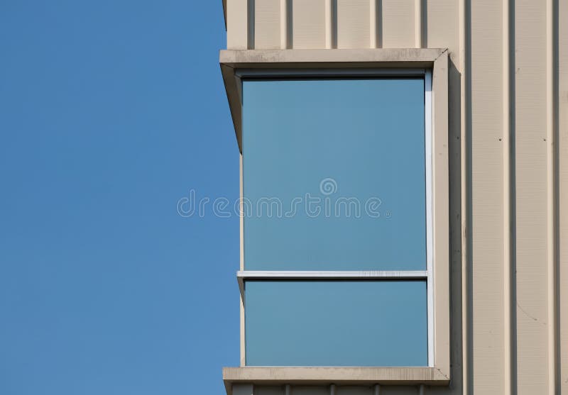 Rectangular Windows on Cream Building Facades Stock Image - Image of ...