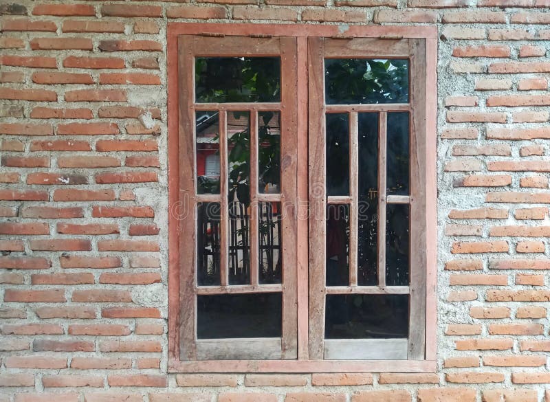 Rectangular Wooden Window Frame with Black Glasses on Unfinished House ...