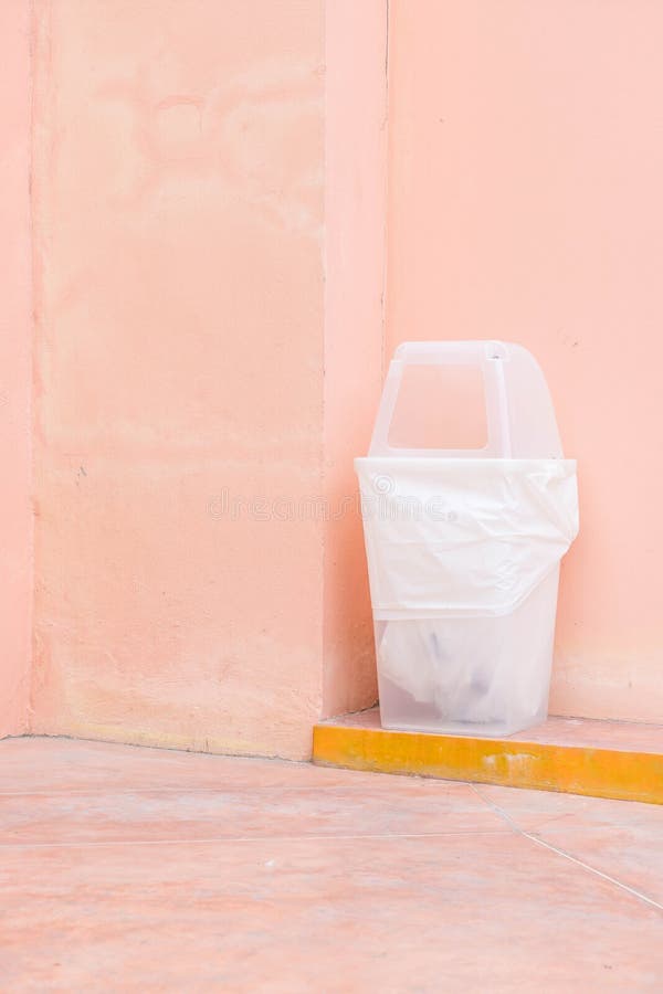 Recycle bin on pink wall stock photo. Image of ecology - 97342072