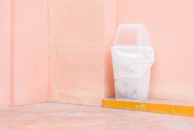 Recycle bin on pink wall stock photo. Image of ecology - 97342072