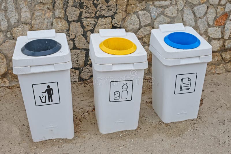 Recycle bins in a beach editorial stock image. Image of green - 239168674