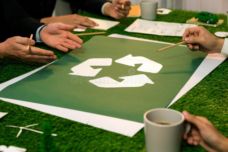 Recycle Icon on Meeting Table with Business People. Quaint Stock Image ...