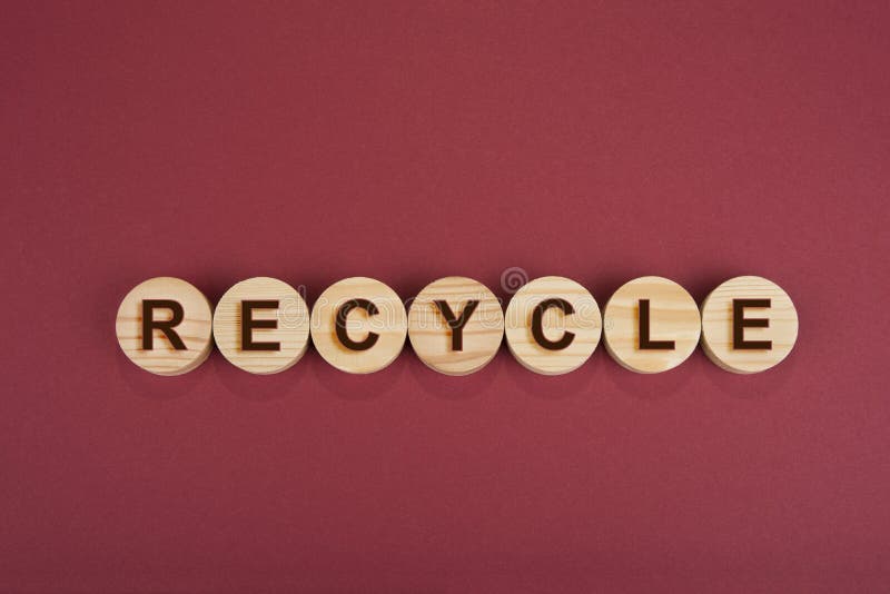 Recycle Sign on a Wooden Circles on a Red Stock Photo - Image of paper ...