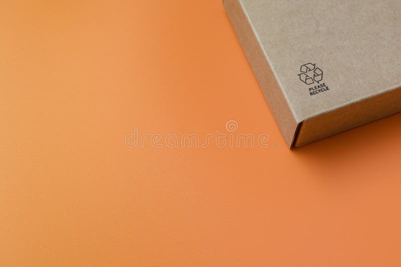 Recycle Symbol on Cardboard Parcel Box on Plain Background Stock Photo ...