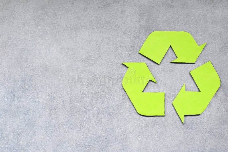 Recycling Symbol and Different Garbage on Gray Background. Stock Photo ...