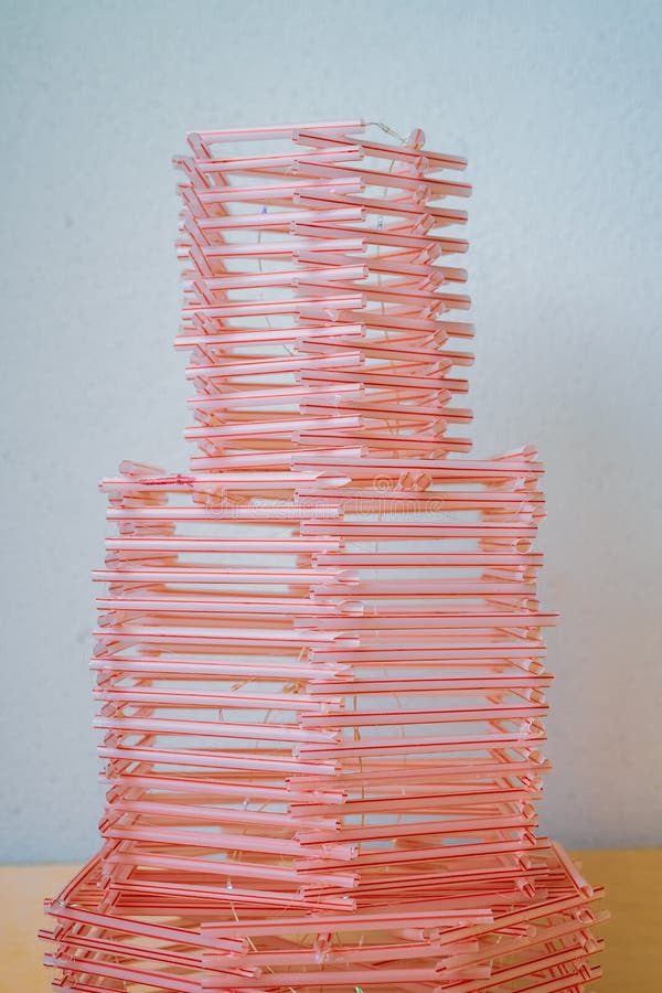 Recycled Straws Construction Building Project. Making a Tall Building ...