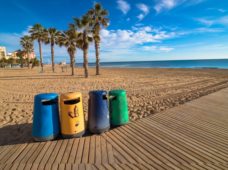 Recycling on the beach stock image. Image of disposal - 65001841
