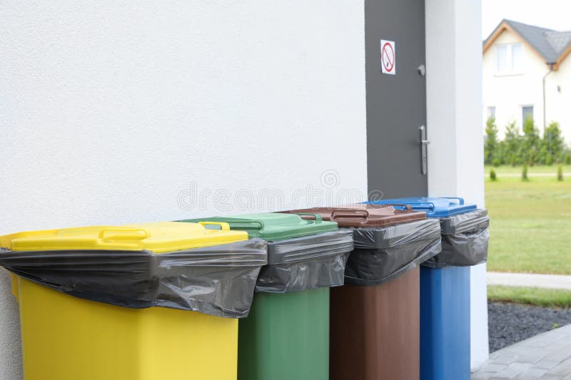 Recycling Bins for Different Garbage Outdoors. Waste Sorting Stock ...