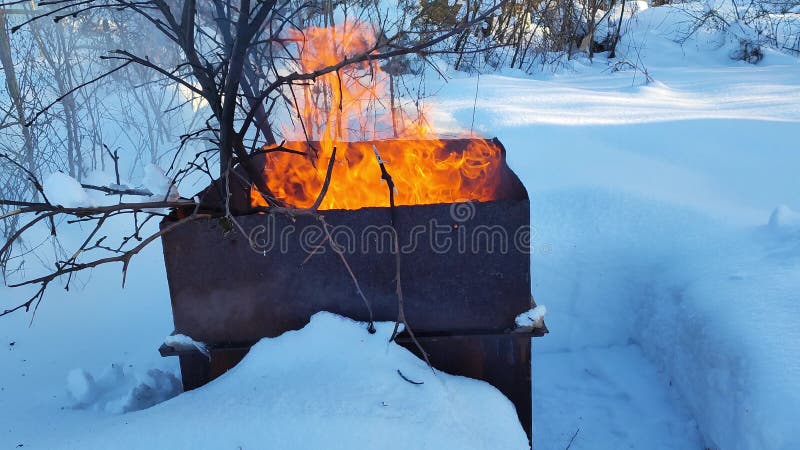 Recycling. Burning Garbage in an Iron Container. Fire Stock Footage ...