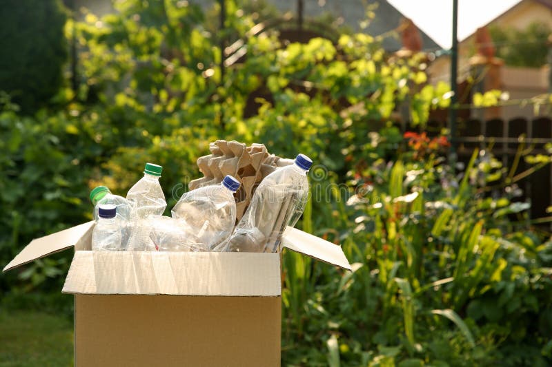 Recycling. Different Garbage in Cardboard Box Outdoors Stock Photo ...