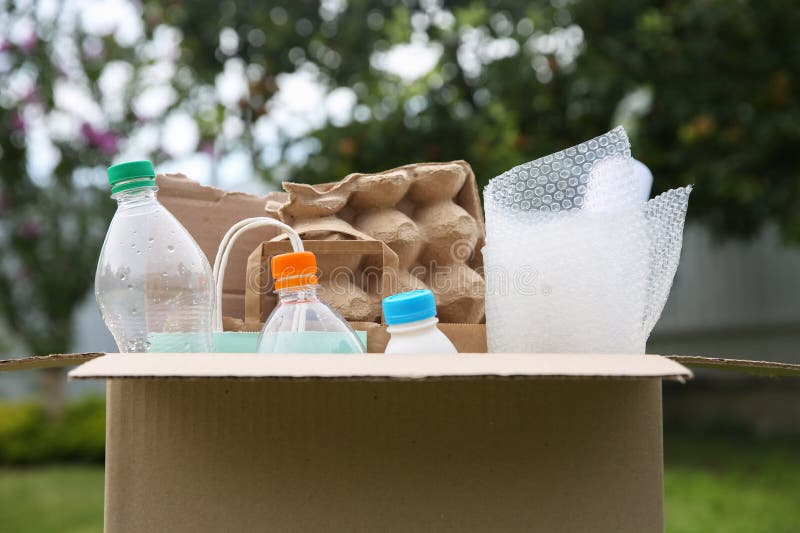Recycling. Different Garbage in Cardboard Box Outdoors Stock Image ...