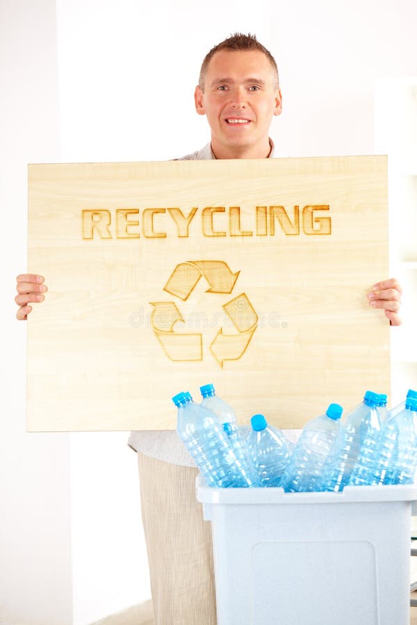 Recycling Man with Board stock photo. Image of environmental - 20513812