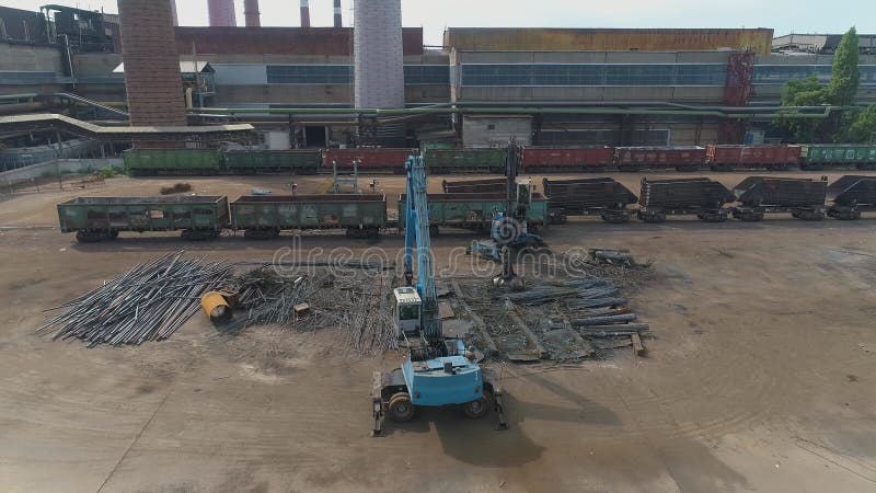 Excavator with Grab, Recycling Metal Waste, Metal Recycling Yard ...