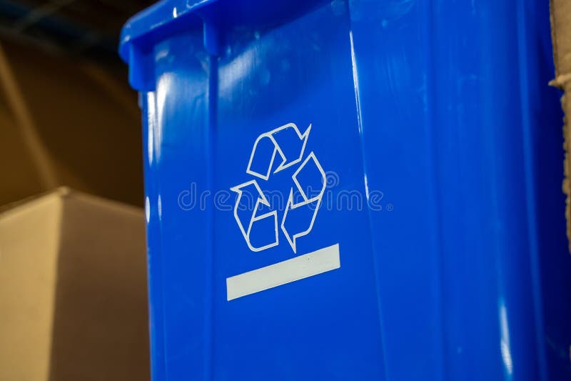 Recycling Symbol on a Blue Plastic Bin Stock Photo - Image of green ...