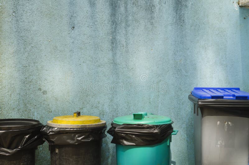 Different Colored Trash Bins for Separate Waste in the Street ... Different Colored Trash Bins for Separate Waste in the Street ...