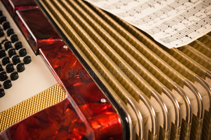 Red Accordion and Sheet Music Stock Photo - Image of keyboard, musical ...