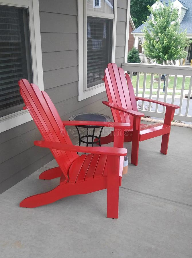 2 Red Adirondack Style Chairs on a Front Porch Stock Image - Image of ...